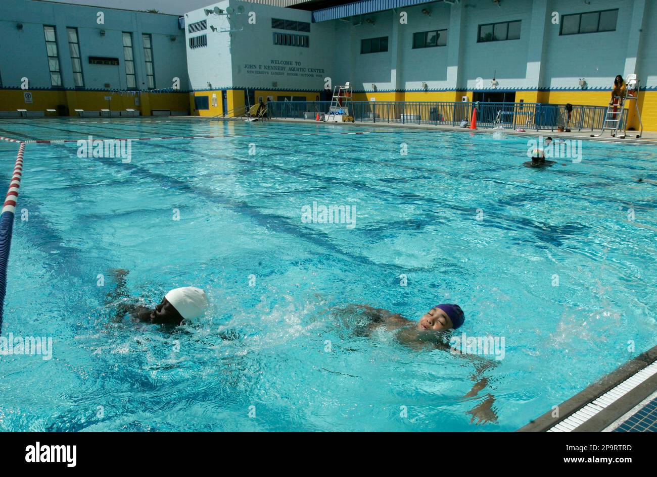 Two young swimmers, Shadaziha Vines, 10, left, and Alexandria Pomales ...