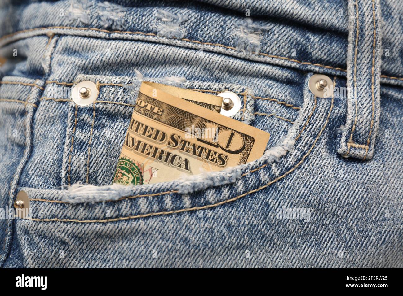 Dollar banknote in pocket of jeans, closeup. Spending money Stock Photo ...