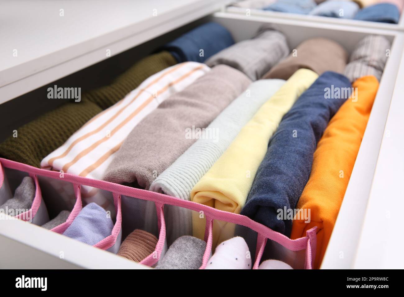 Sweaters jeans folded hi-res stock photography and images - Alamy
