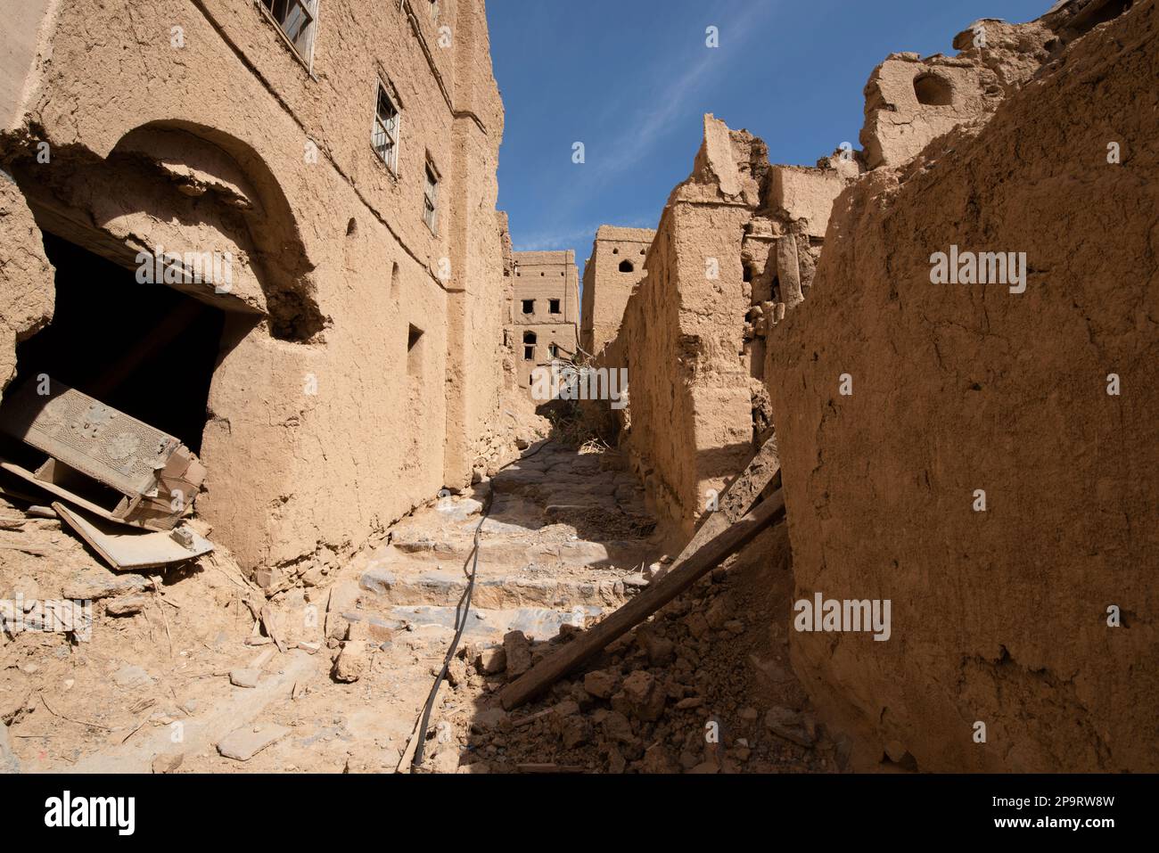 Falling down mud-brick ruins of the old village in Al Hamra, Oman Stock ...