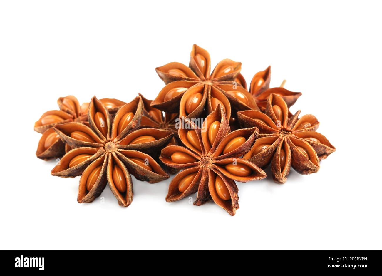 Dry anise stars with seeds on white background Stock Photo - Alamy