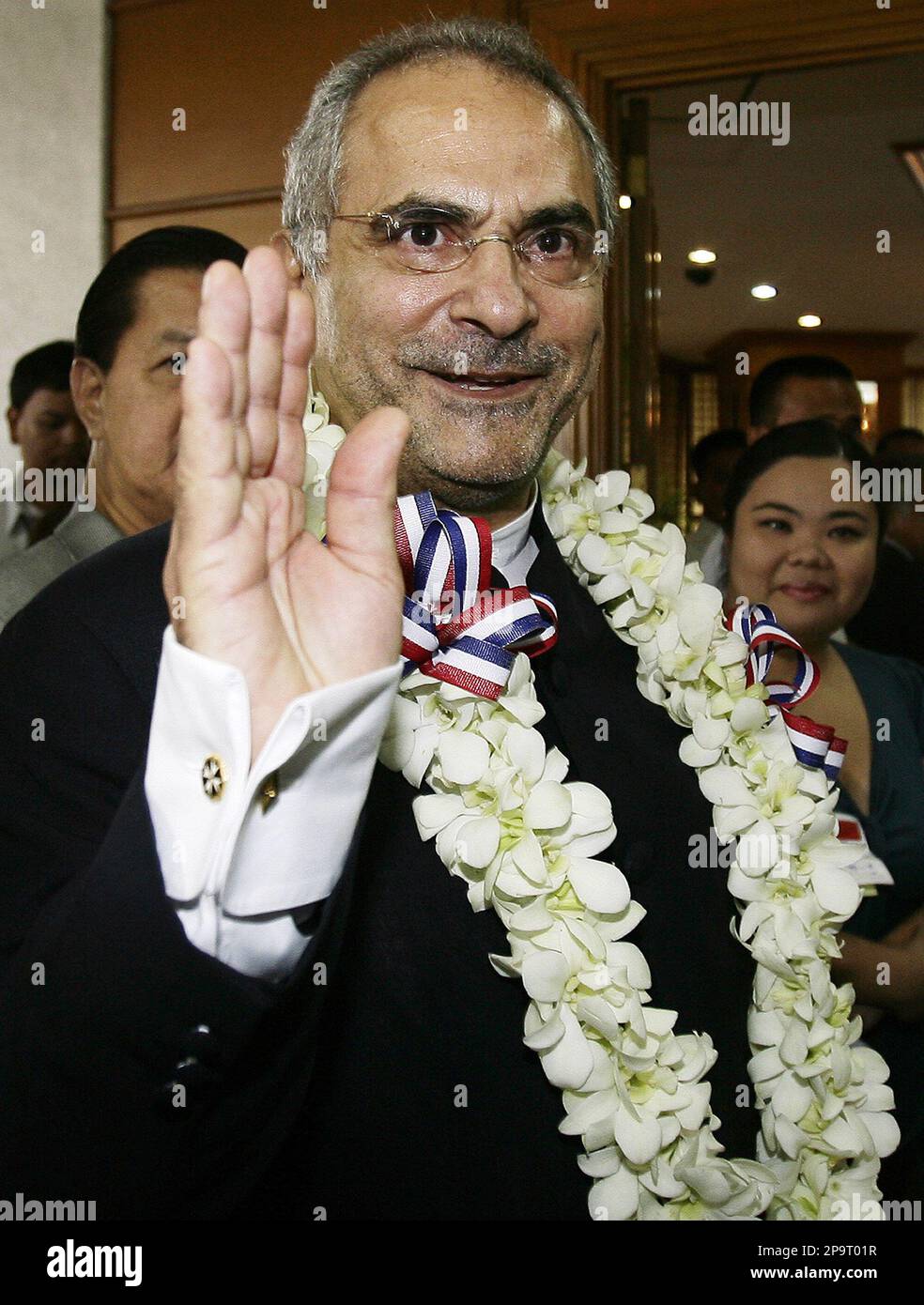 East Timor's President Jose Ramos-Horta waves to reporters as he ...