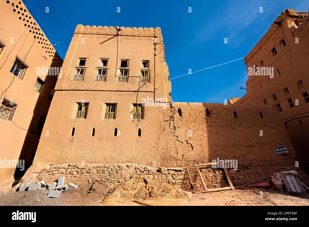 Falling down mud-brick ruins of the old village in Al Hamra, Oman Stock ...
