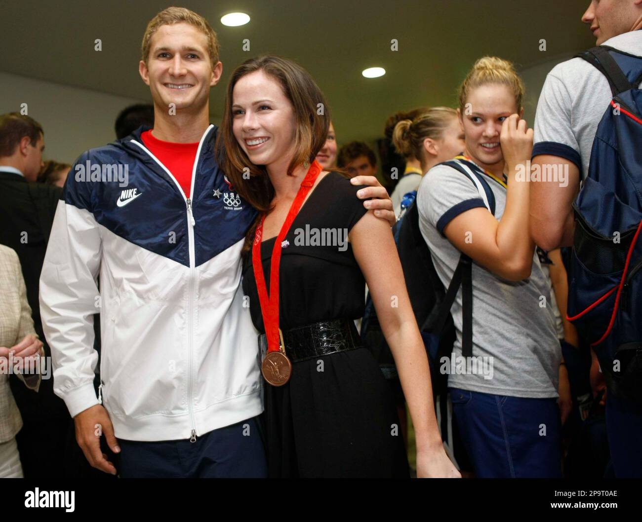 Barbara Bush, daughter of President Bush,wears the bronze medal of ...