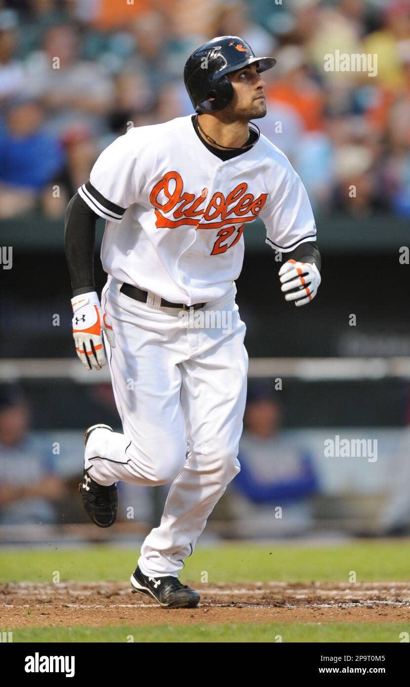 Baltimore Orioles Nick Markakis hits a three run home run against Texas ...