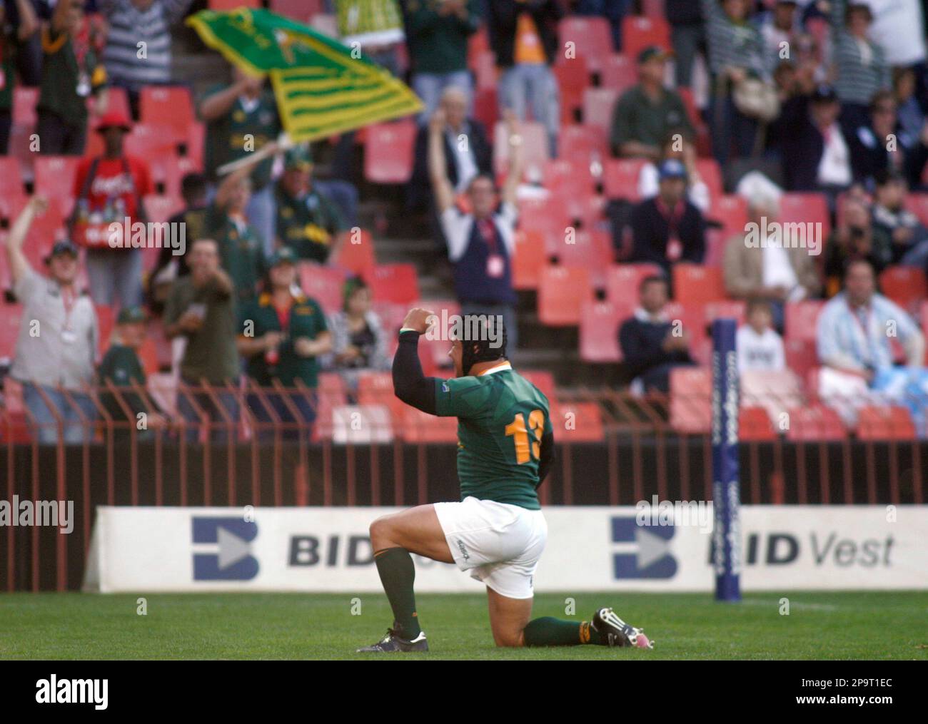 South Africa's Adrian Jacobs, celebrates after scoring a try during the ...