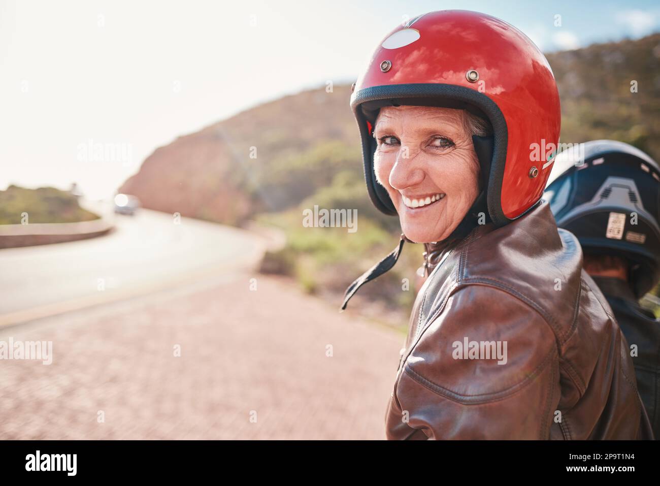 Old woman driving a motorcycle hi-res stock photography and images - Alamy