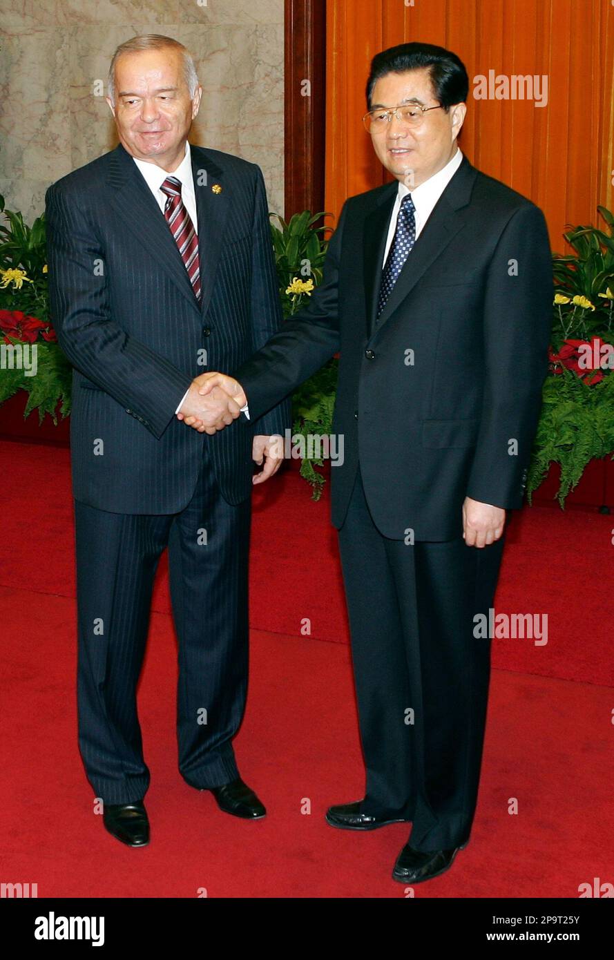 Chinese President Hu Jintao, right, meets Uzbekistan President Islam ...