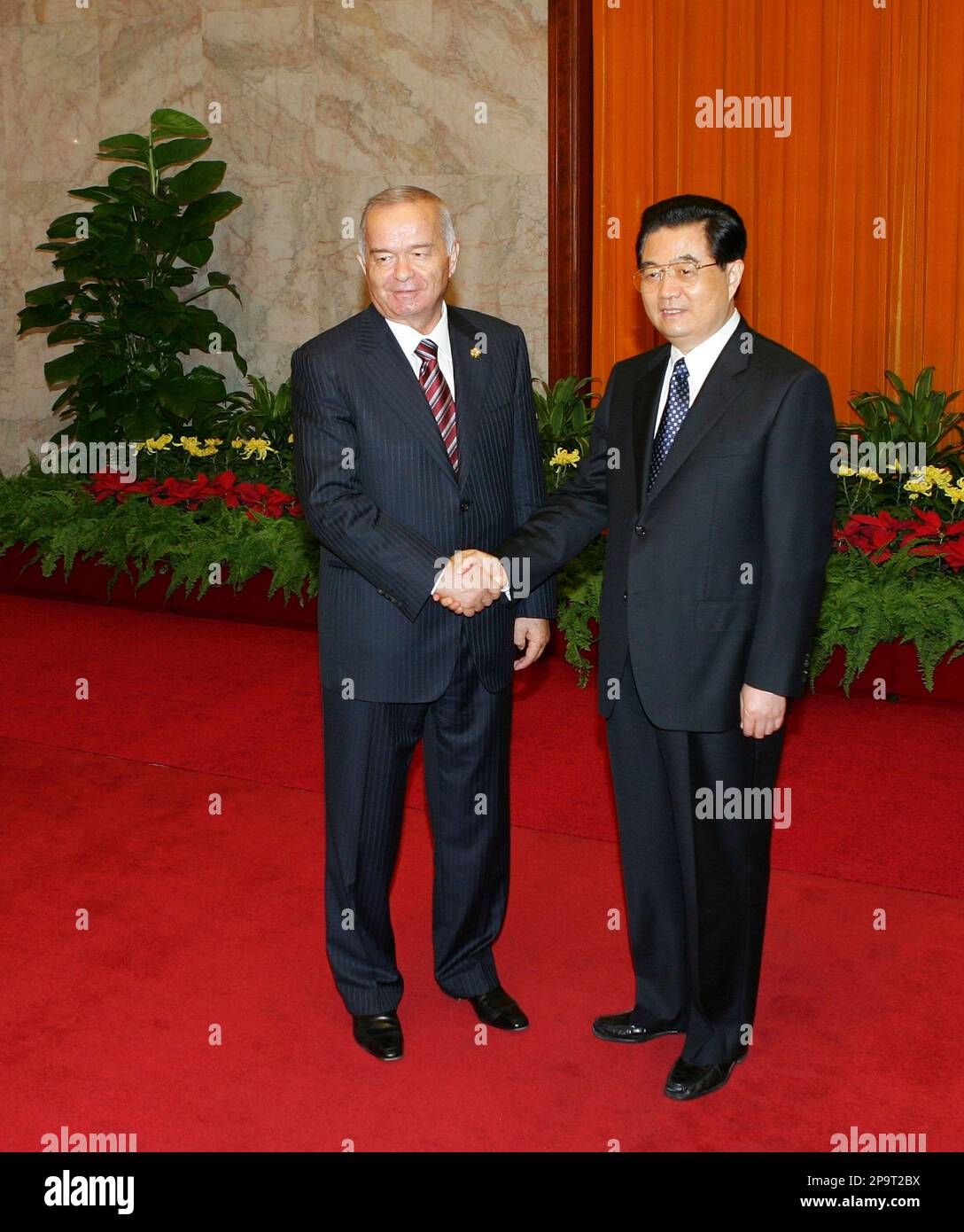 Chinese President Hu Jintao, right, meets Uzbekistan President Islam ...
