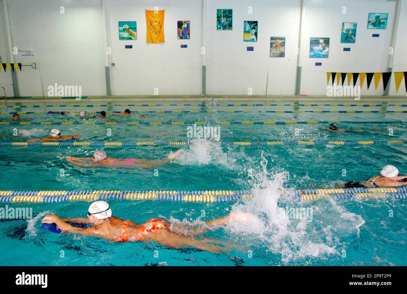 Swimmers train in the pool at the North Baltimore Aquatic Club, Tuesday ...
