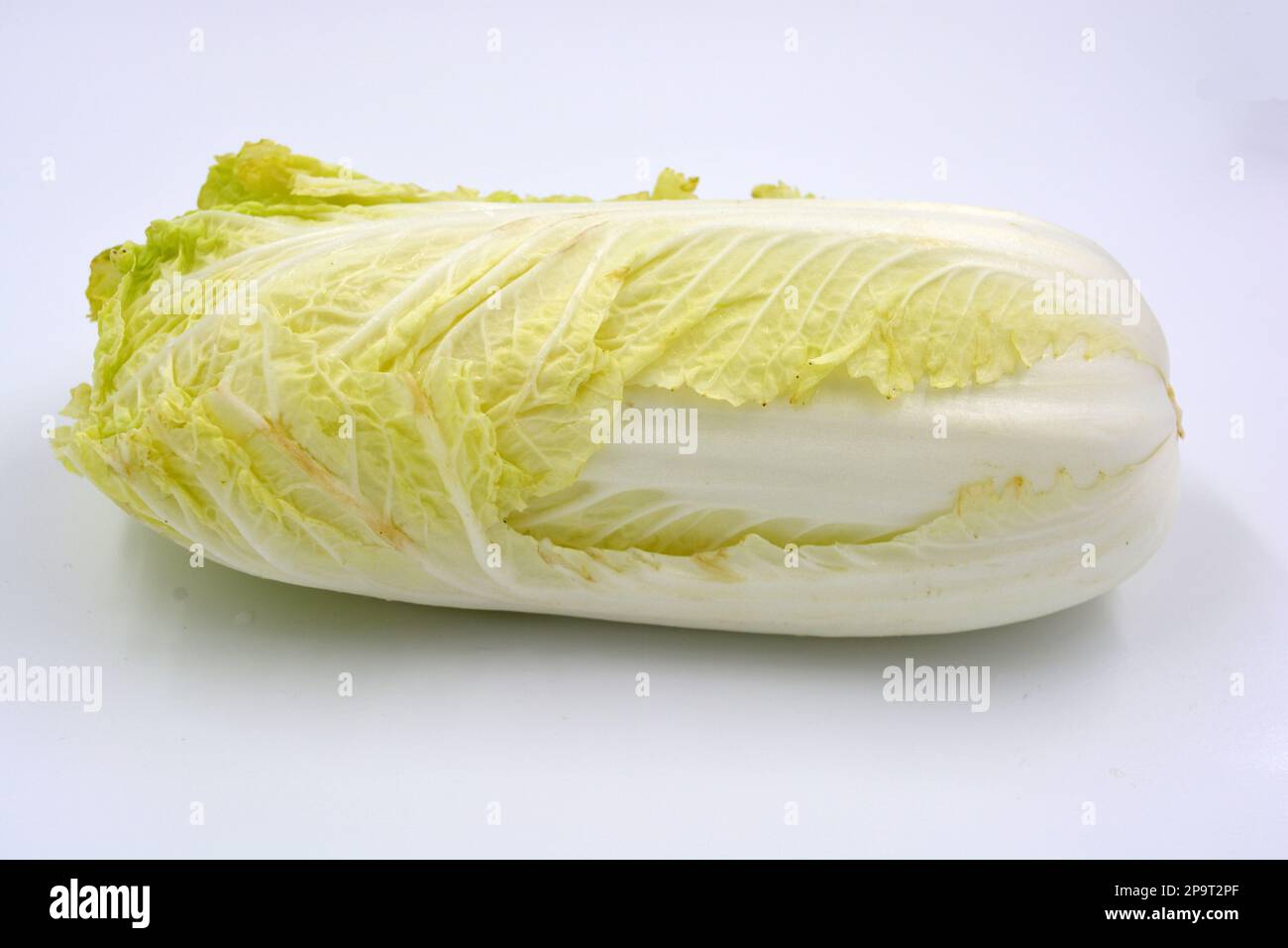A large cabbage, Peking cabbage located on a white background. Healthy ...