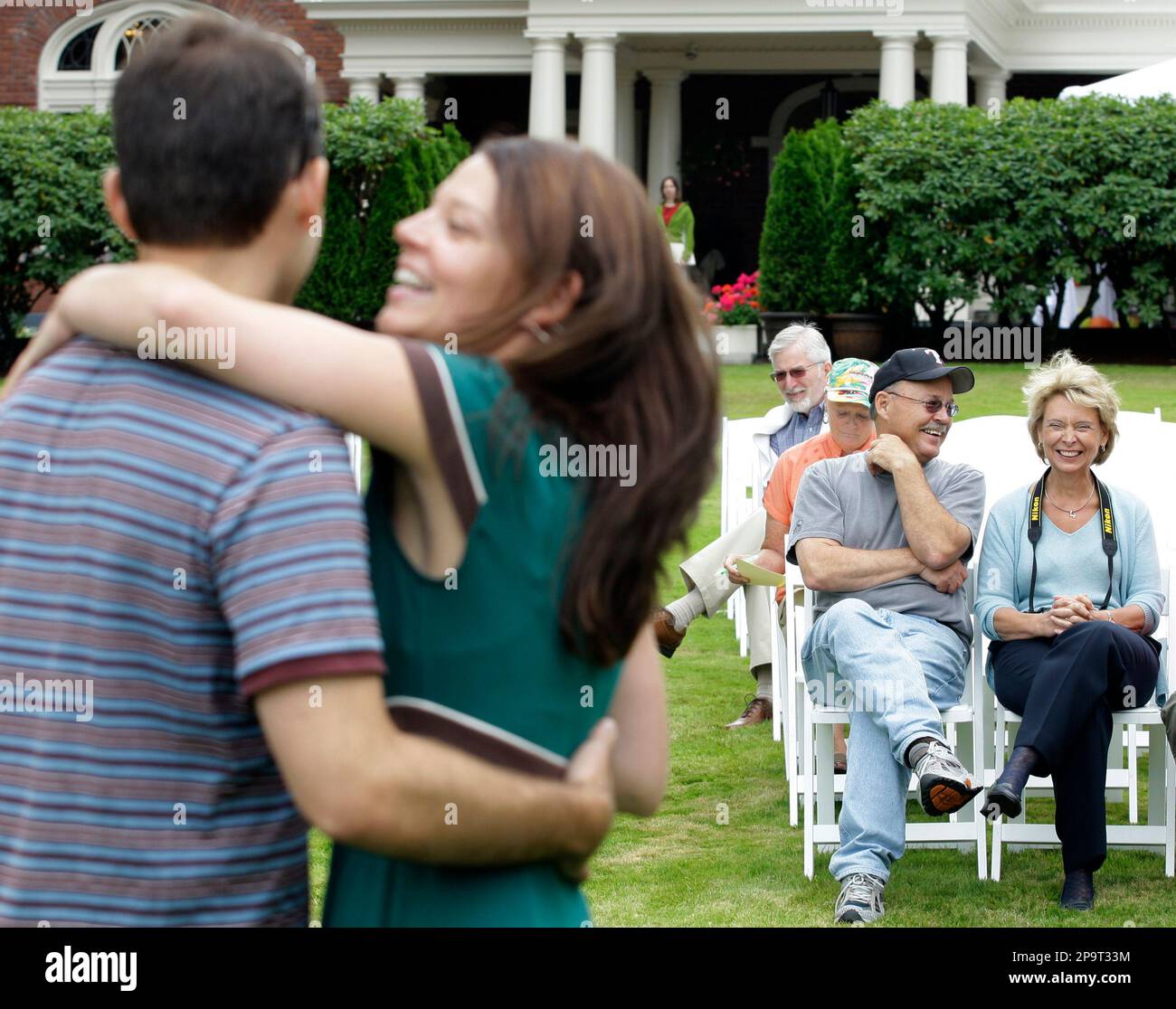 Washington Gov. Chris Gregoire, right, and her husband Mike look on Friday, Aug. 8, 2008, as ...