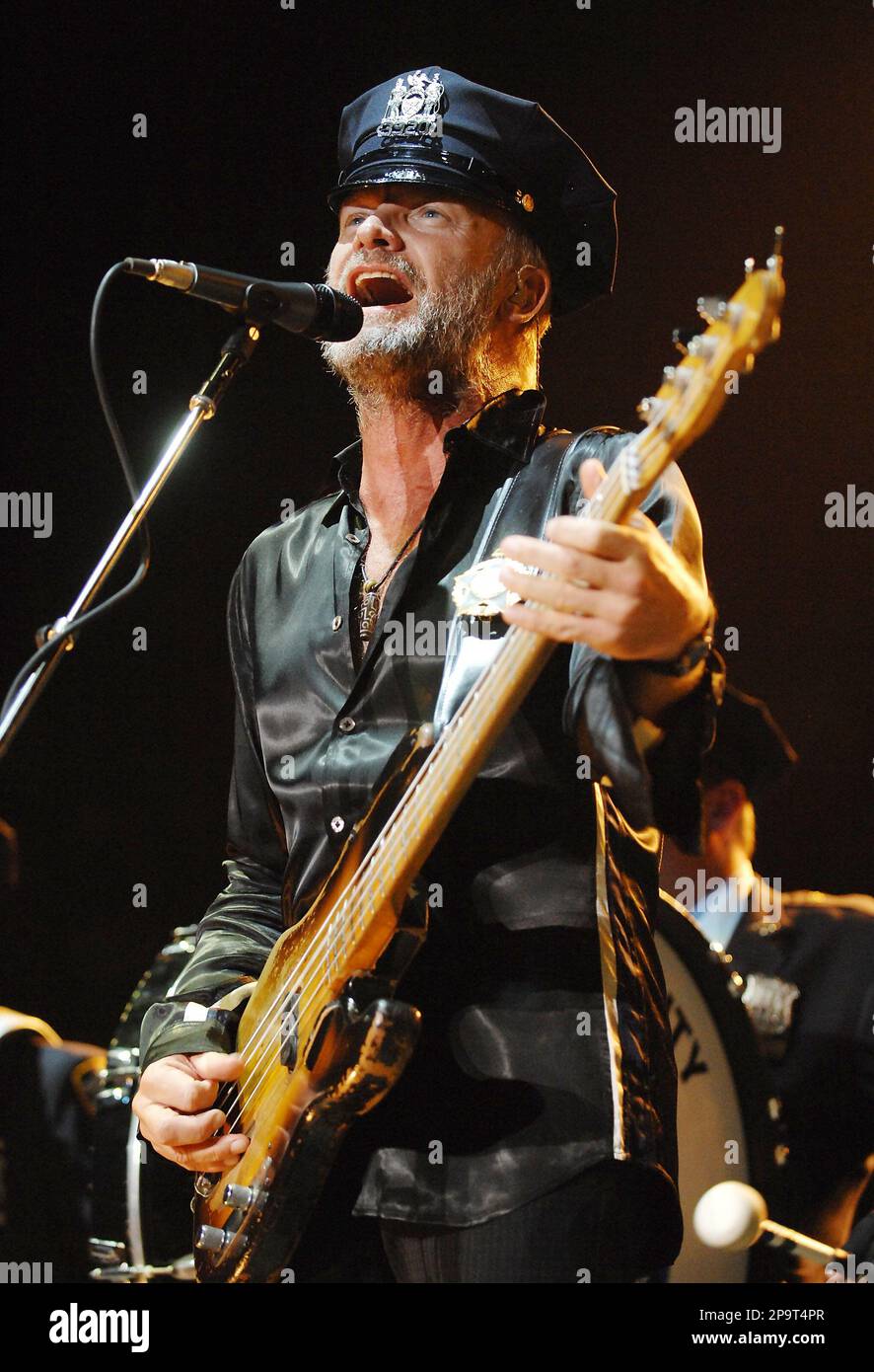 Lead vocalist and bassist Sting and his band The Police perform their ...