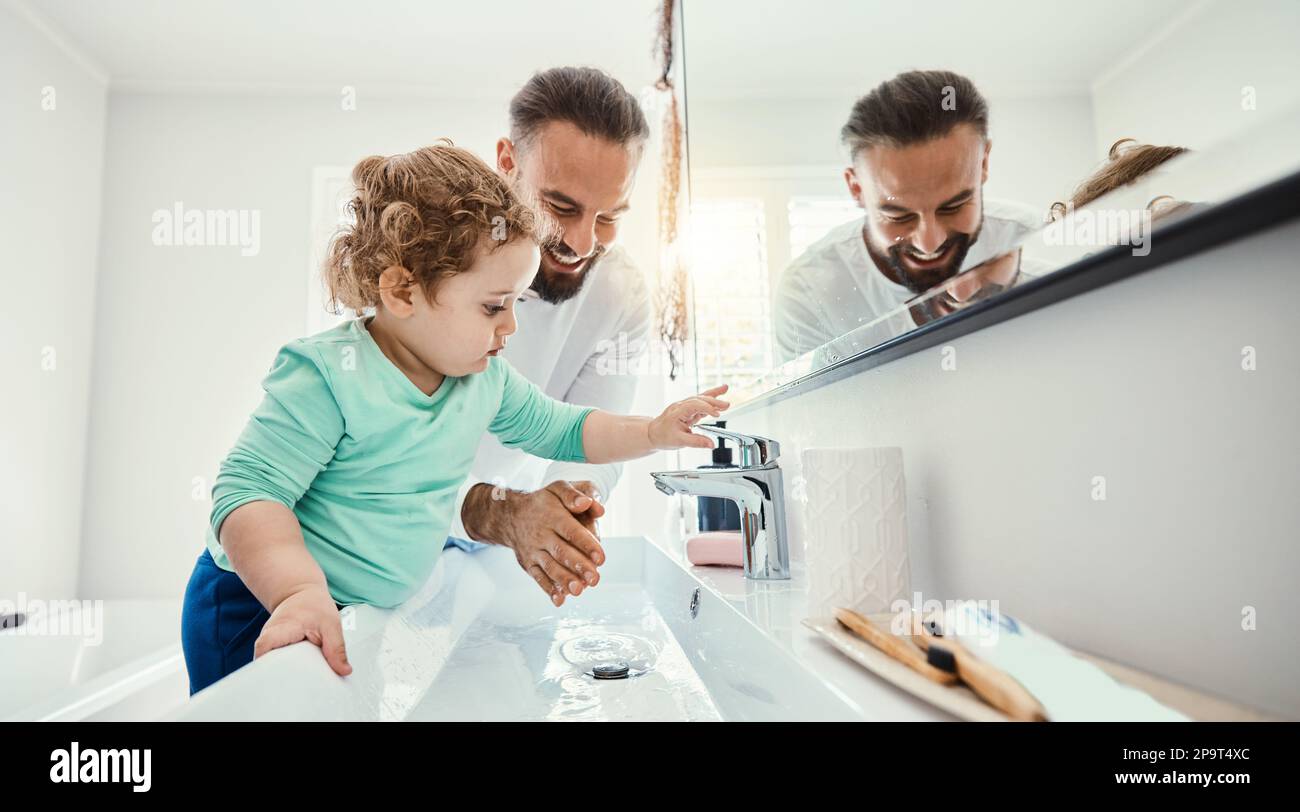 Cleaning, washing hands and father with baby in bathroom for hygiene ...