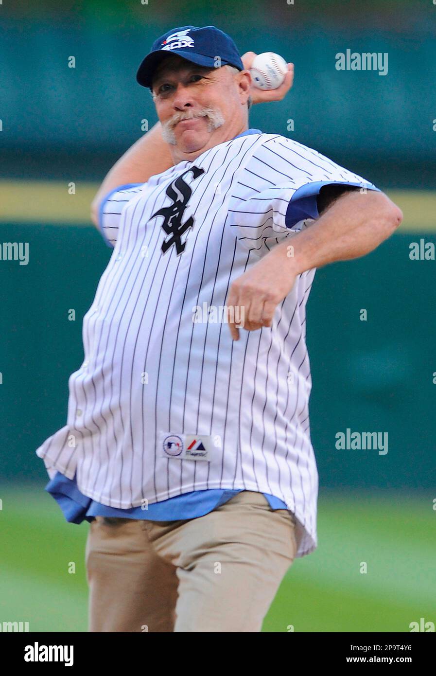 Hall of Fame pitcher Goose Gossage throws the ceremonial first pitch ...