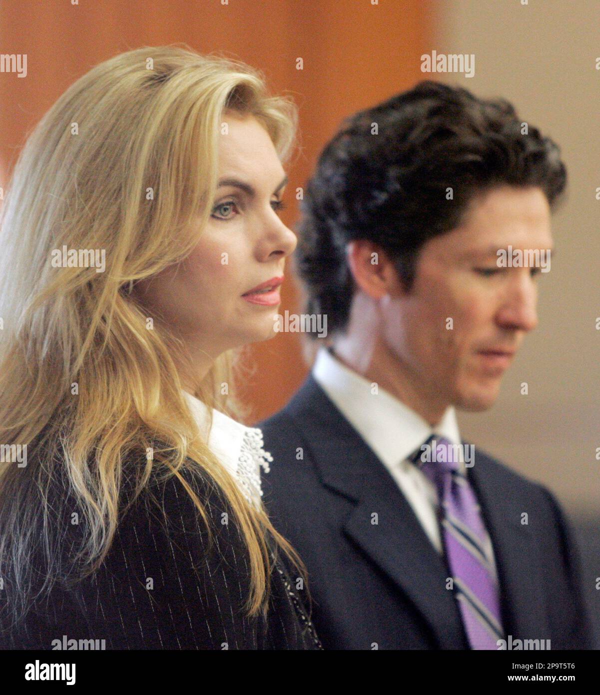 Victoria Osteen and her husband, evangelist Joel Osteen, wait in court ...