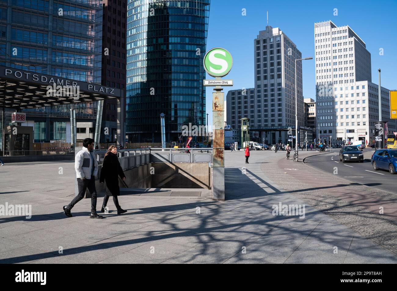 28.02.2023, Berlin, Germany, Europe - People in between high-rise ...