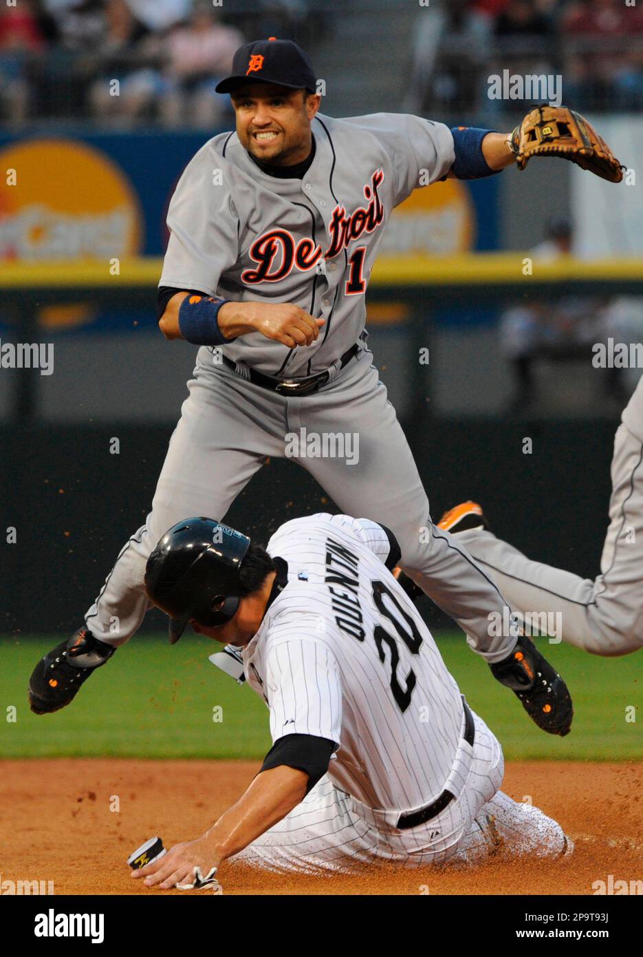 Detroit Tigers' Placido Polanco watches his throw to first base after ...