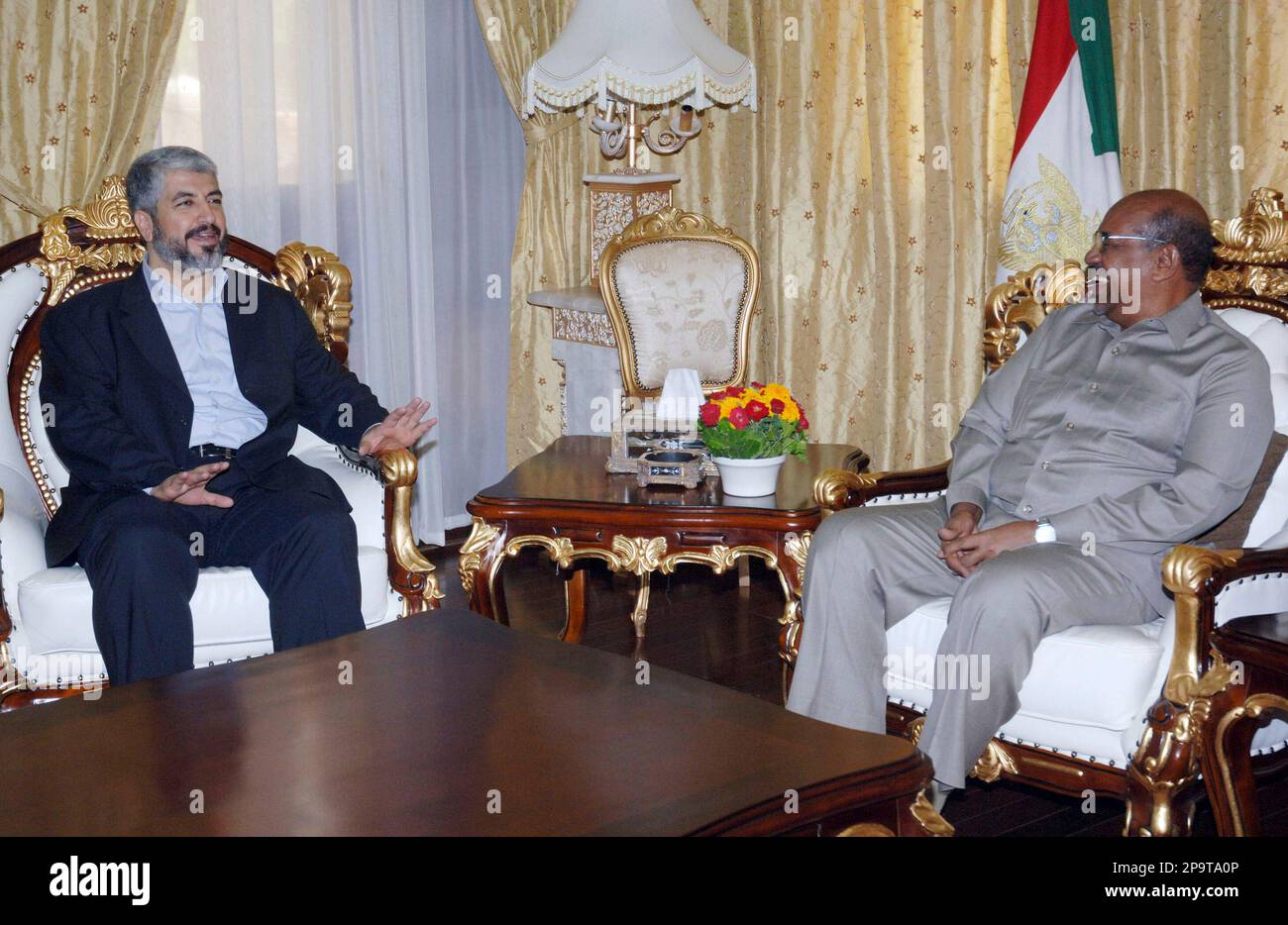 Sudanese President Omar El-Bashir, right receives Hamas leader Khaled ...