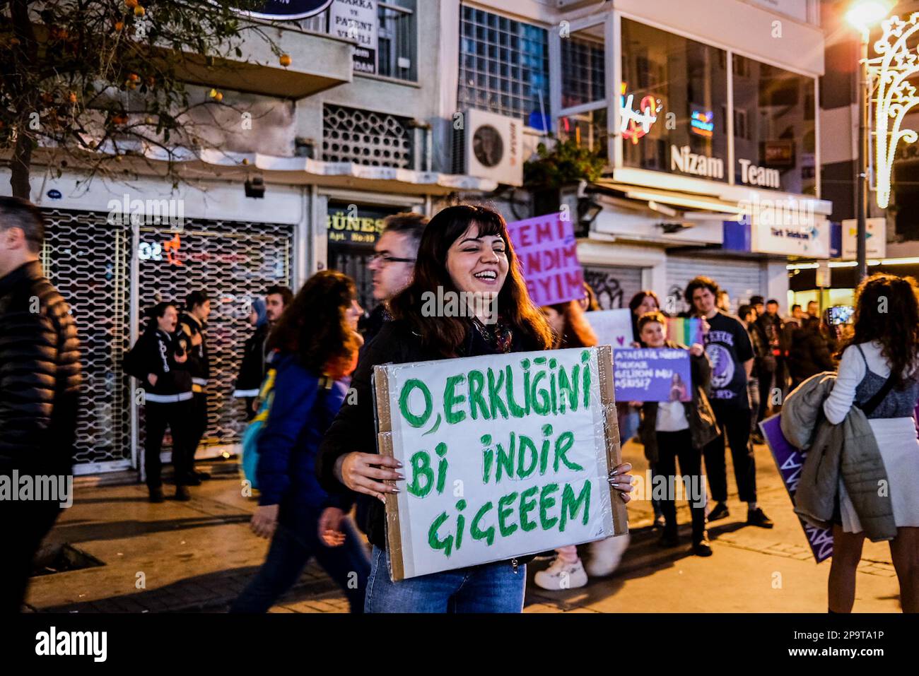 Izmir, Turkey. 08th Mar, 2023. Protester hold placards expressing their ...
