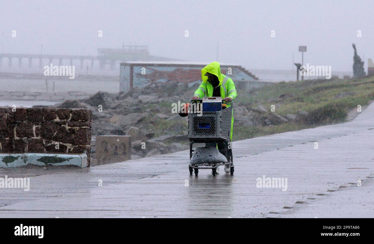 Kerry-Douglas Vredenburg walks along the seawall in Galveston, Texas ...