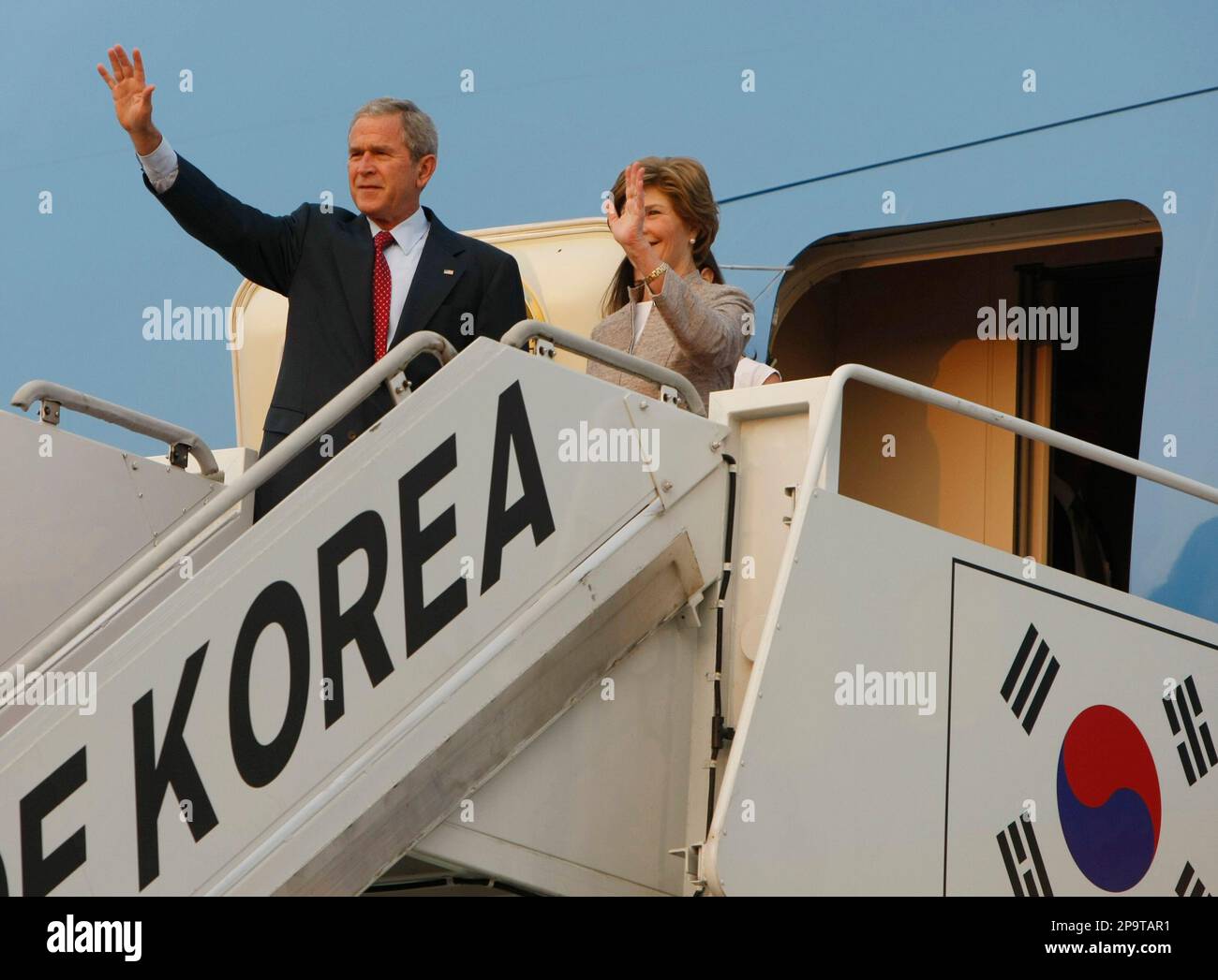 President Bush and first lady Laura Bush arrive at Seoul Airbase in ...