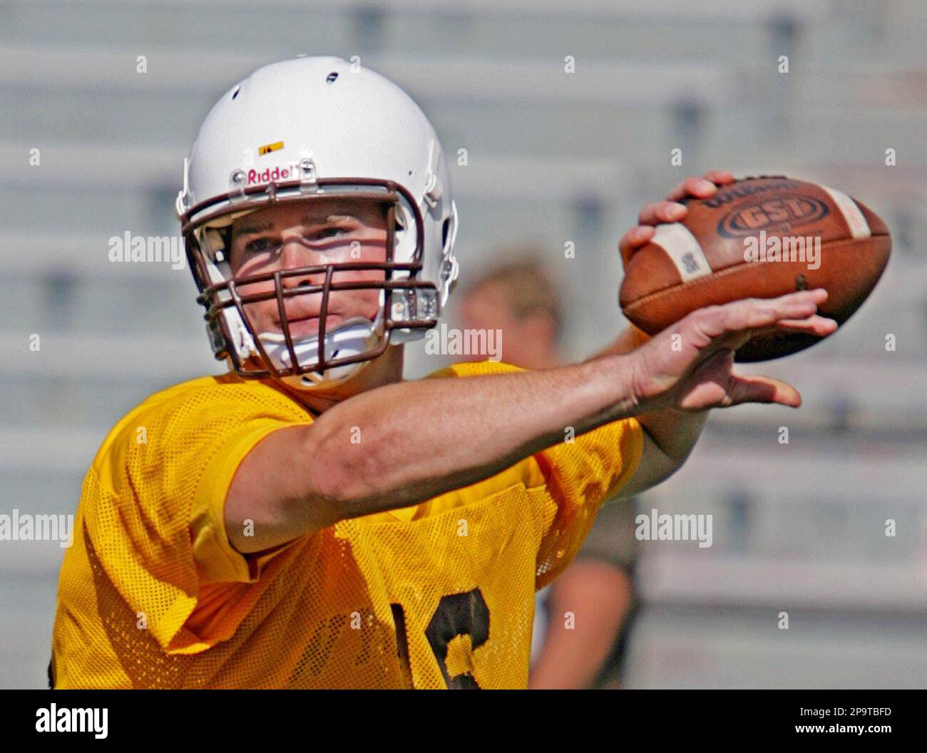Wyoming junior quarterback Karsten Sween drops back to throw a pass ...