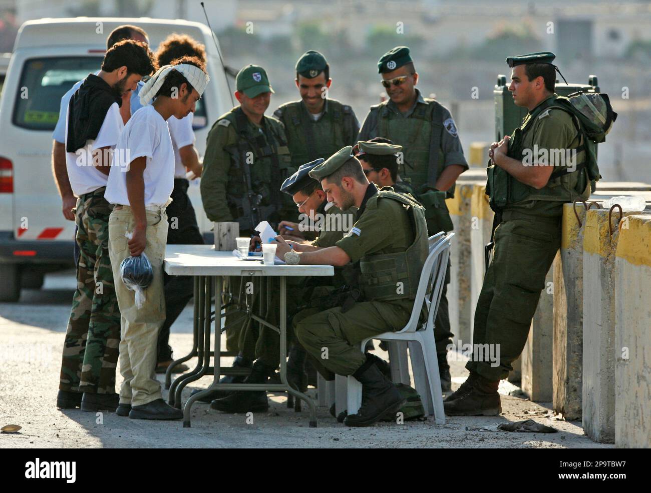 Palestinians, members of the Fatah-allied Hilles clan in Gaza, have ...