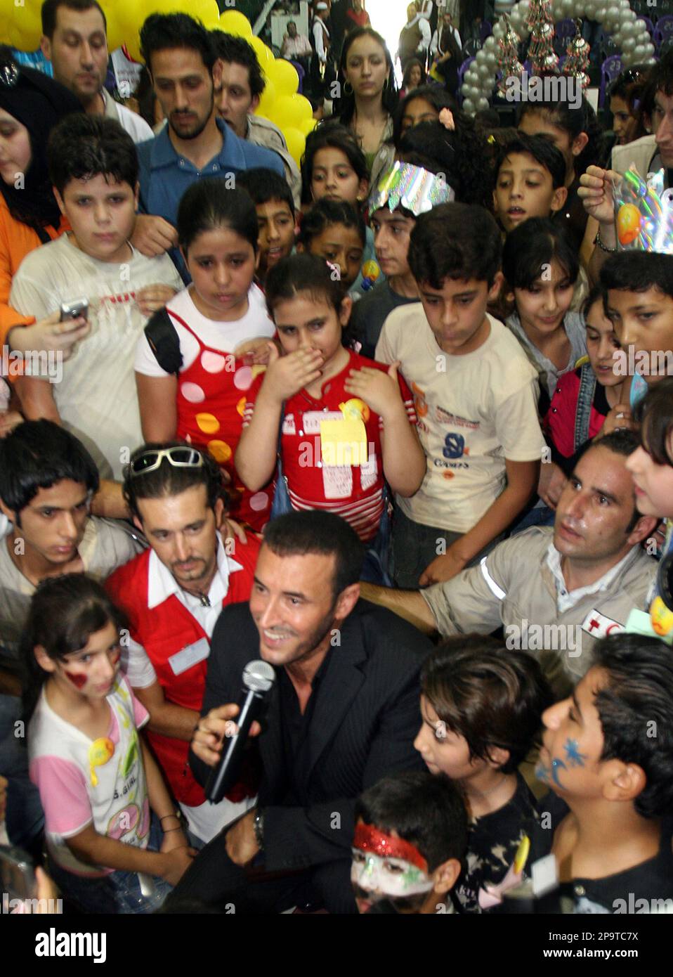Iraqi singer Kazem al-Saher, front, performs in front of around 400 ...