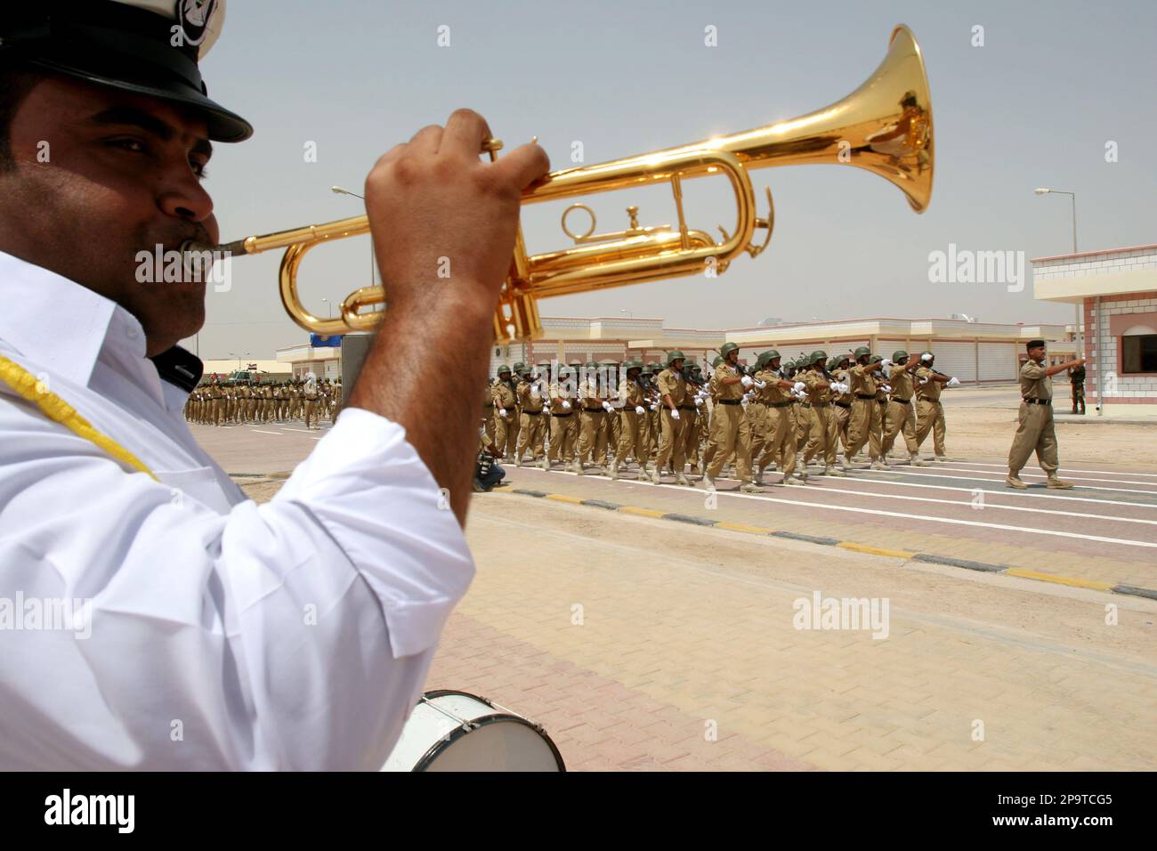Iraqi border guards march during a ceremony to open a new headquarters ...