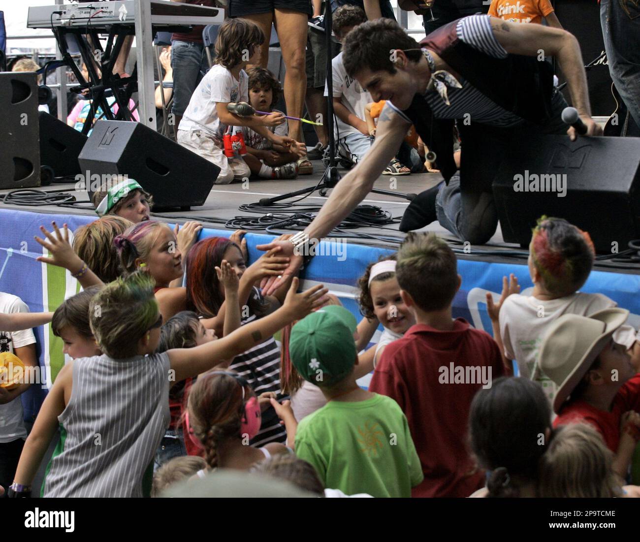 Perry Farrell greets children at the Kidzapalooza stage during ...