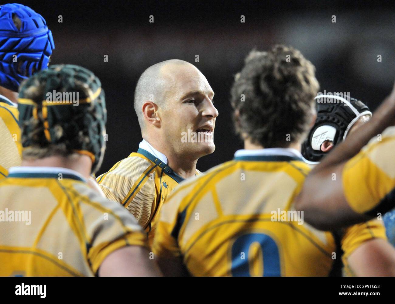 Australia's captain Stirling Mortlock, center, encourages his team in ...