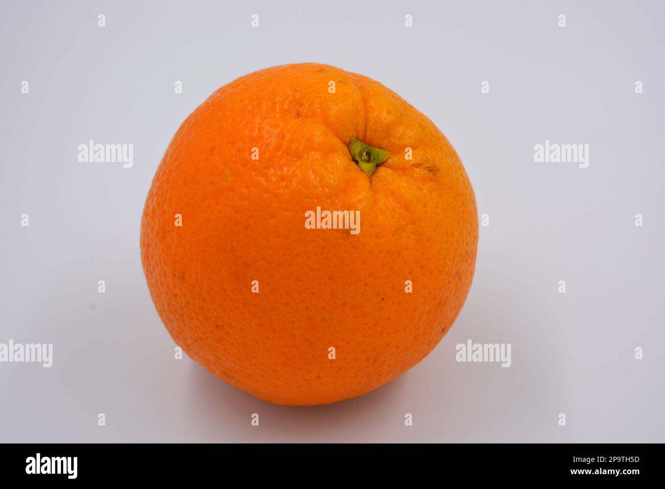 Delicious and healthy ripe fruits, one large orange sweet orange ...