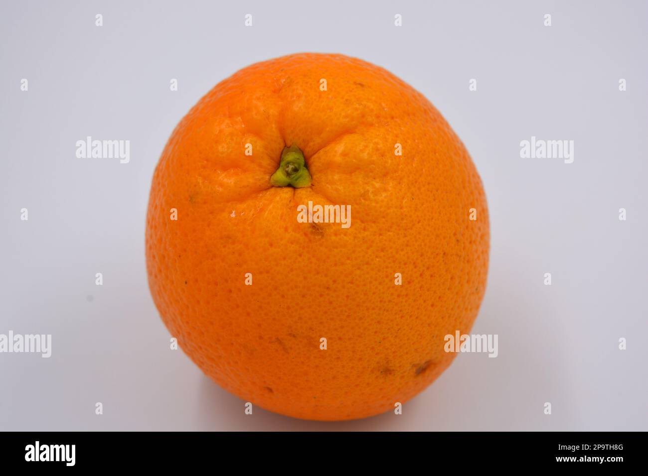 Delicious and healthy ripe fruits, one large orange sweet orange ...