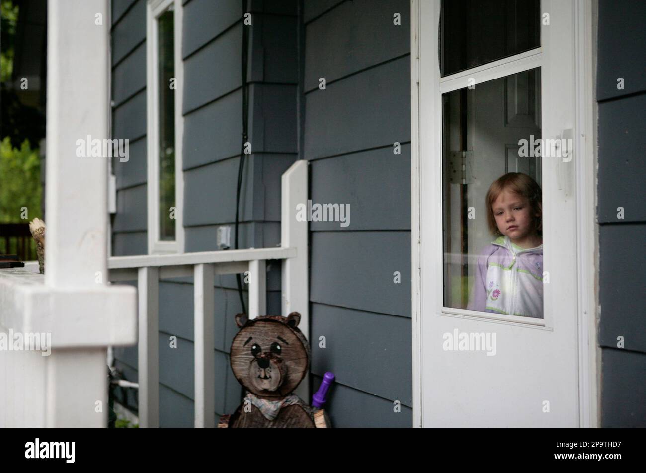 Emily Johnson, Sgt Janelle Johnson's youngest daughter, looks out the ...