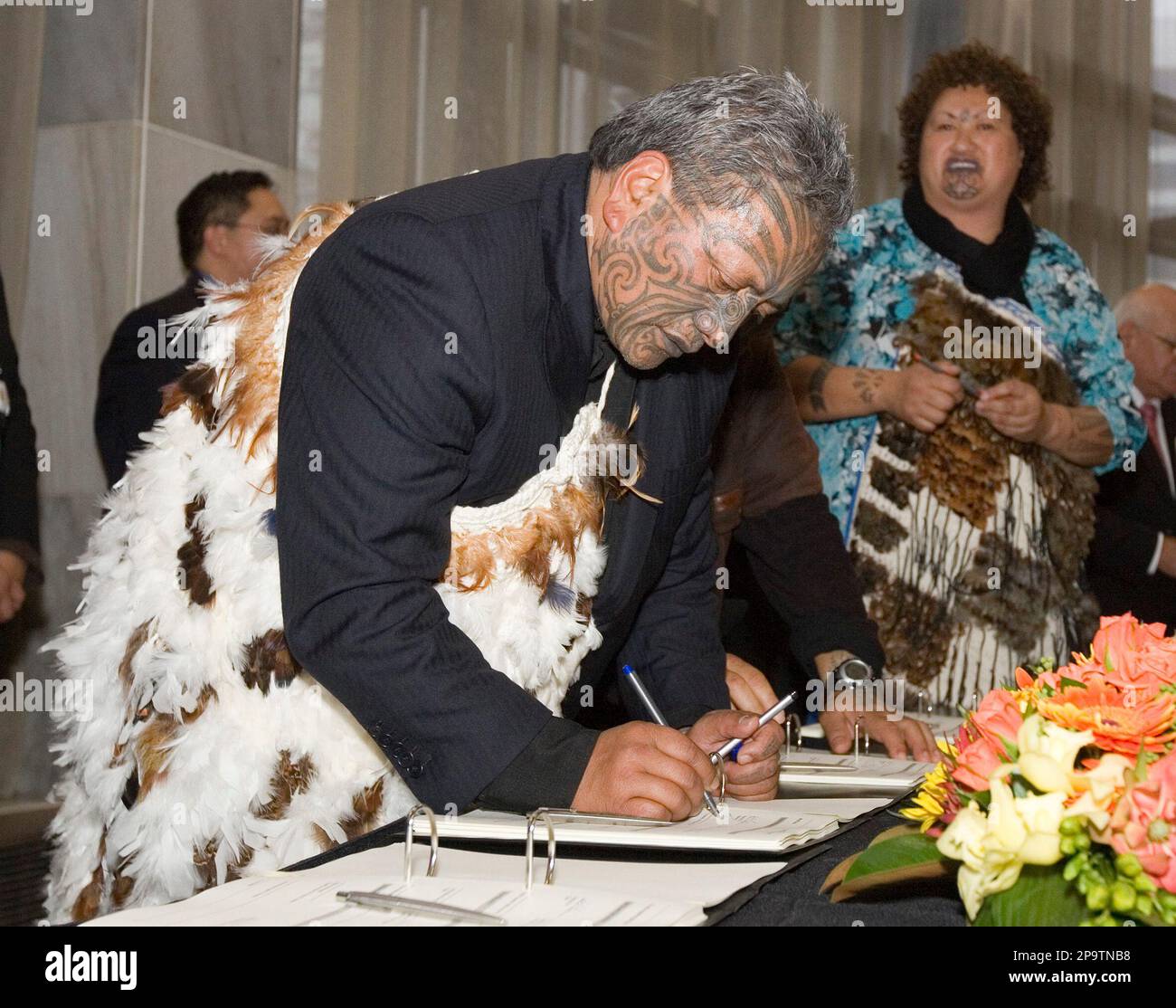 Tribal leader Tama Iti signs the Ngai Tuhoe terms of negotiation ...