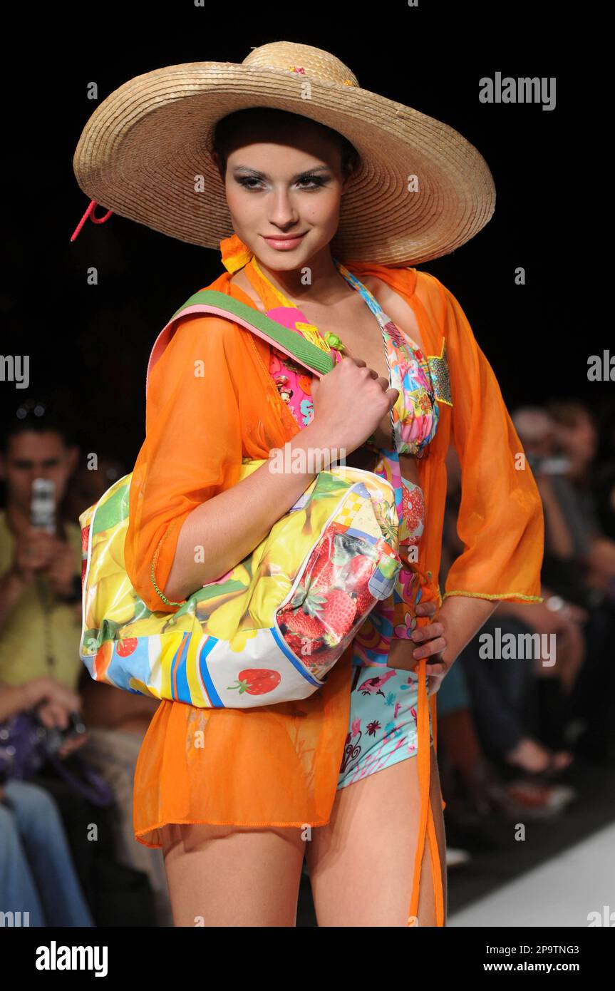 A model displays a creation by students of the Foundation University of ...