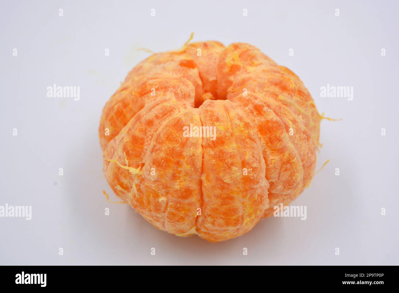 Ripe and delicious fresh fruit, peeled orange tangerine without skin ...