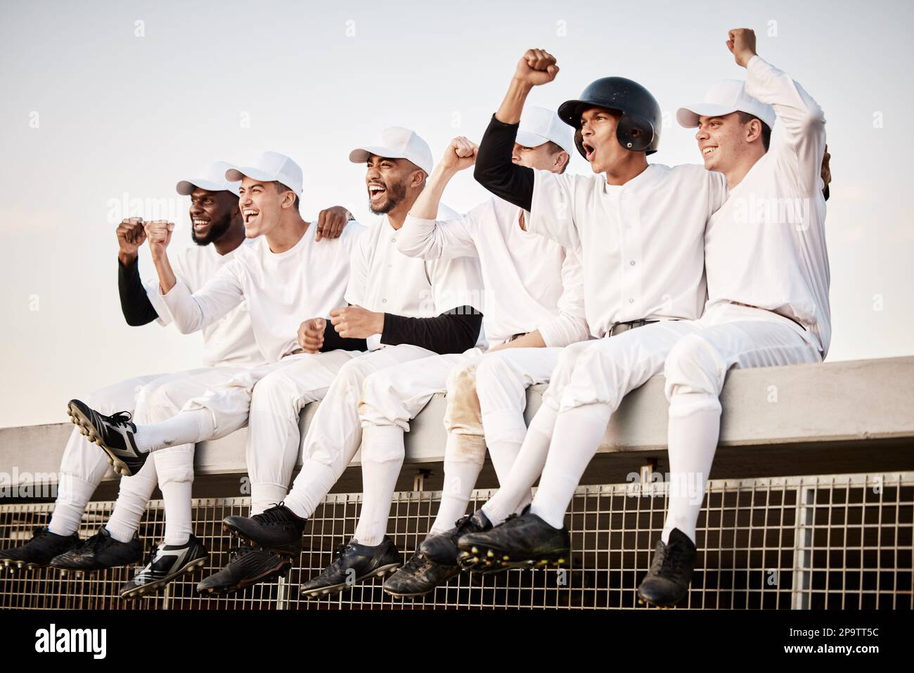 Baseball, team and winner with fist pump and happy men, athlete group ...