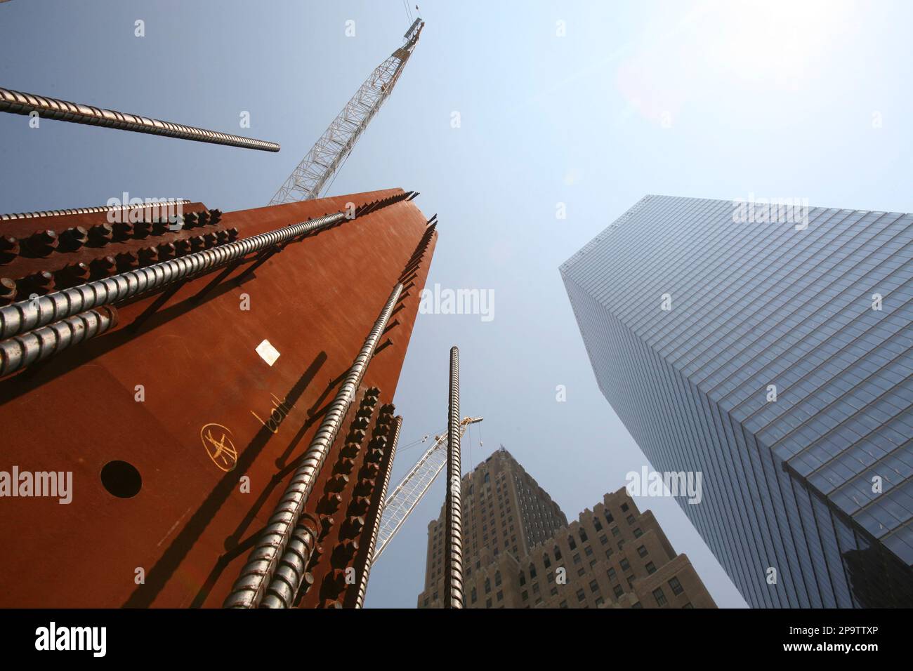 A steel column rises skyward at the Freedom Tower construction site at ...