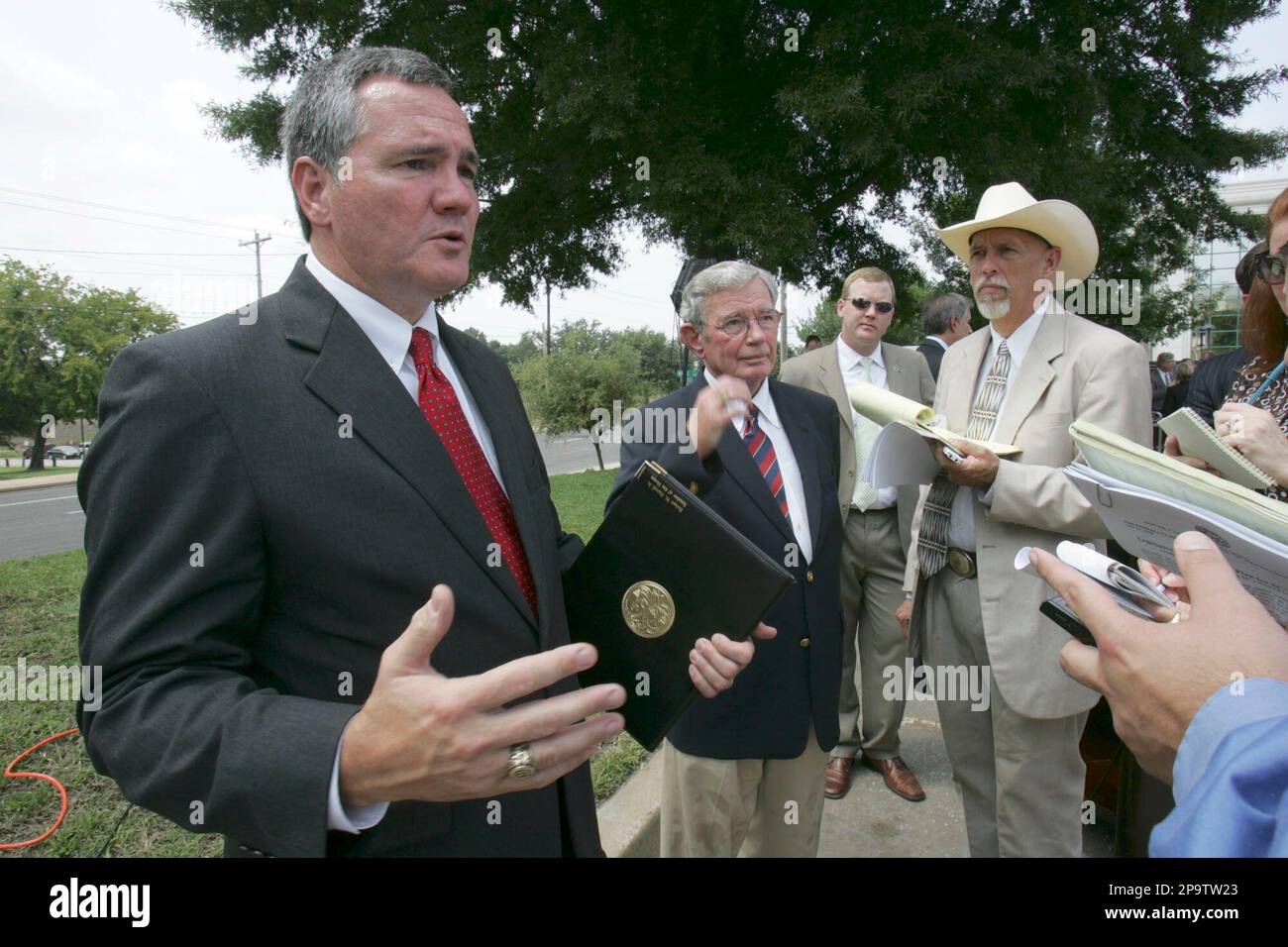 South Carolina House Speaker, Bobby Harrell, left, answers questions ...