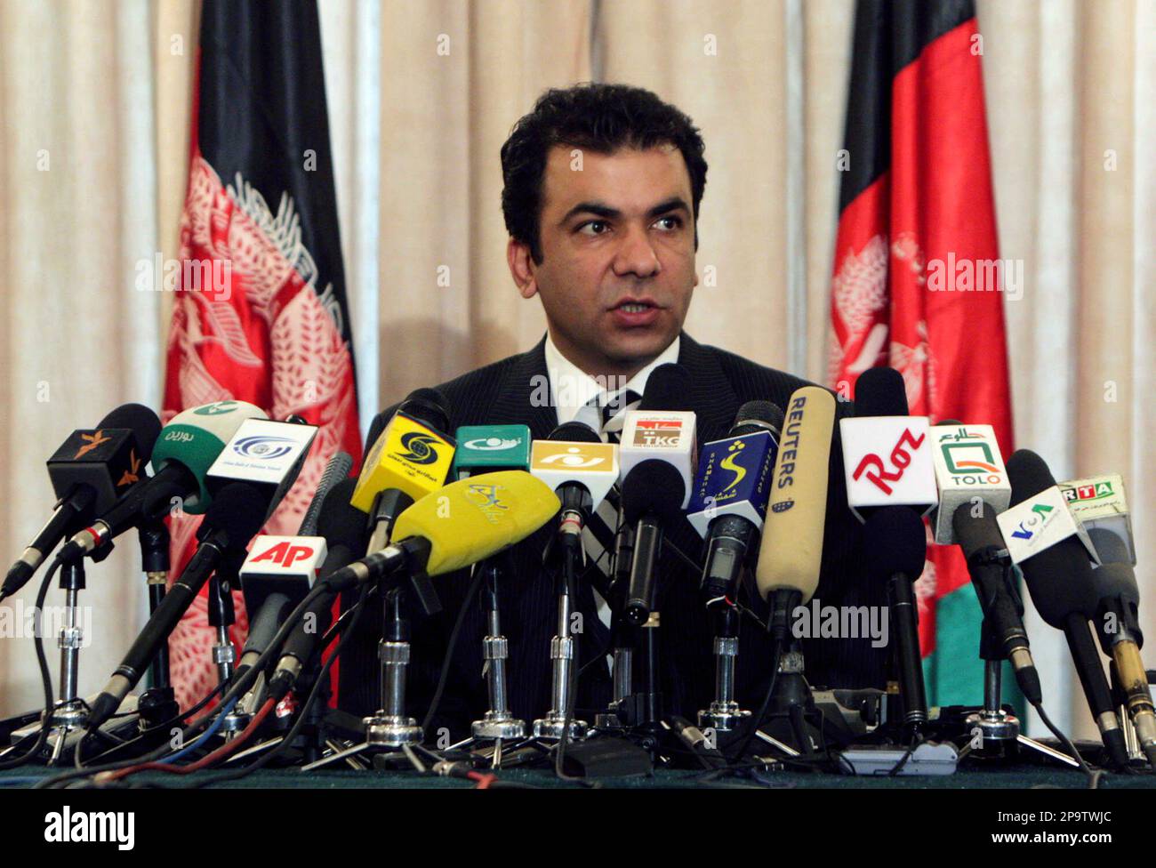 Humayun Hamidzada spokesman for President Hamid Karzai gestures during ...
