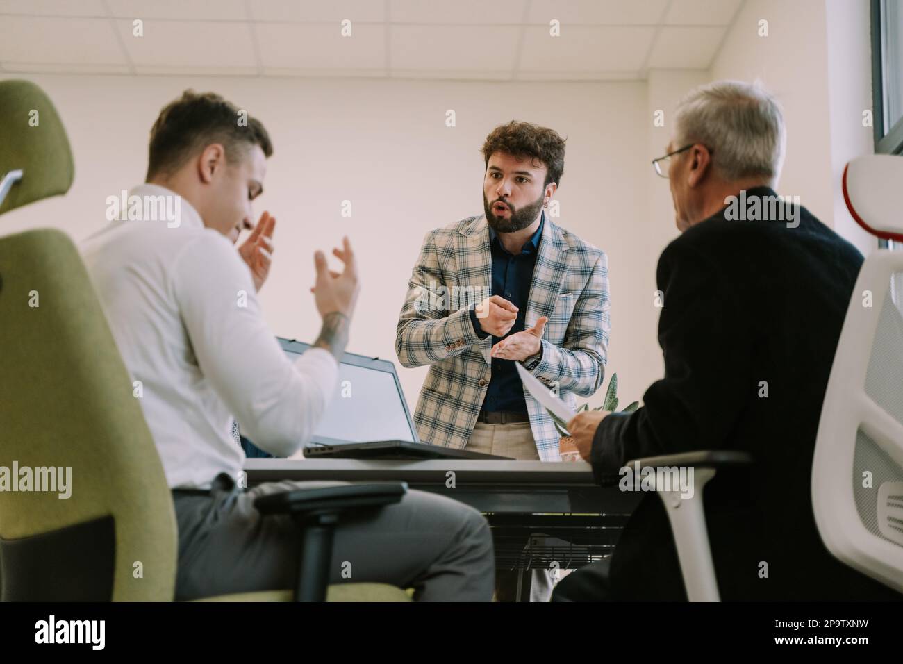 Angry colleagues men only hi-res stock photography and images - Alamy
