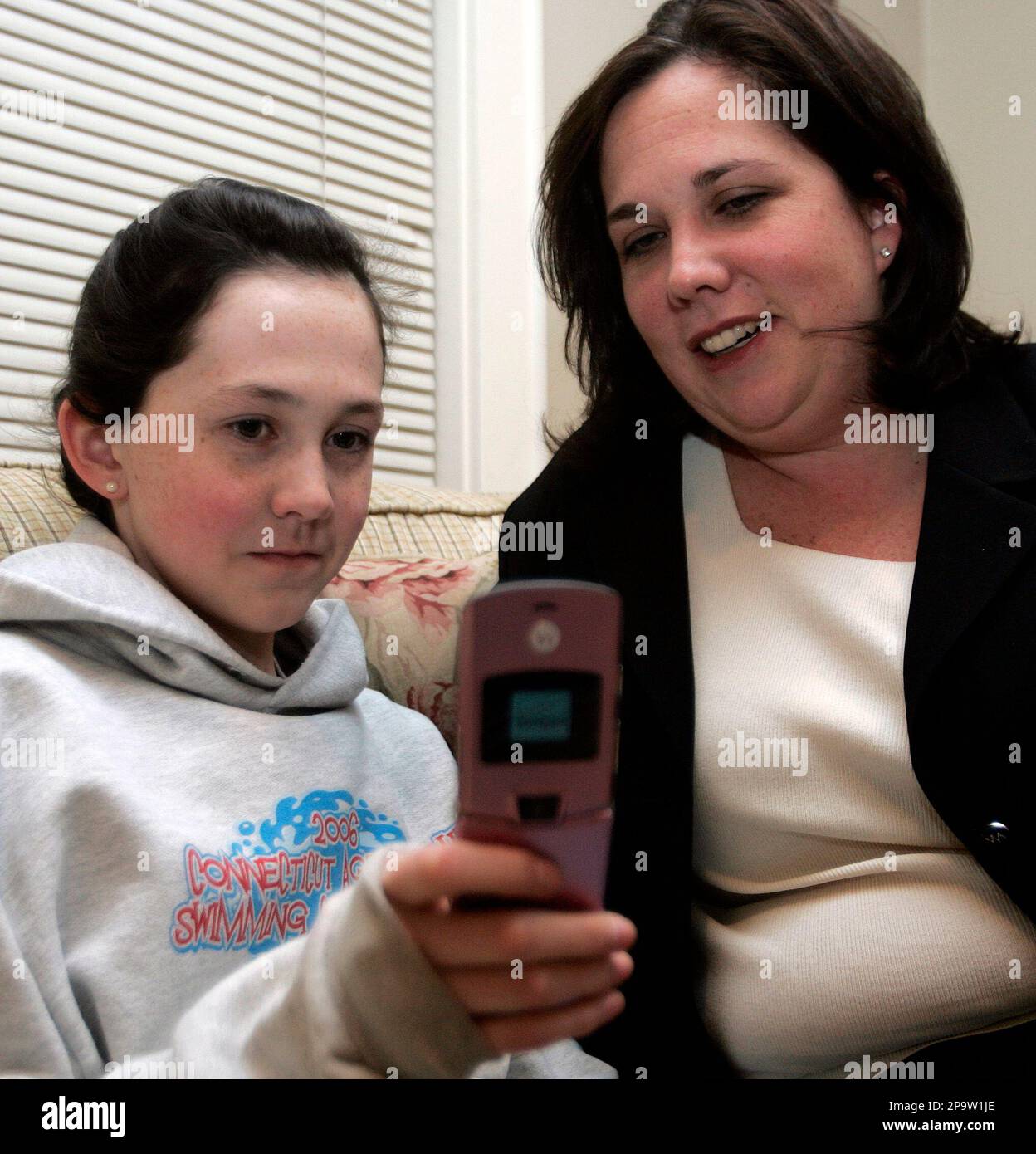**FILE** This Jan. 25, 2008 file photo shows Meghan Mulvany, 12, left ...