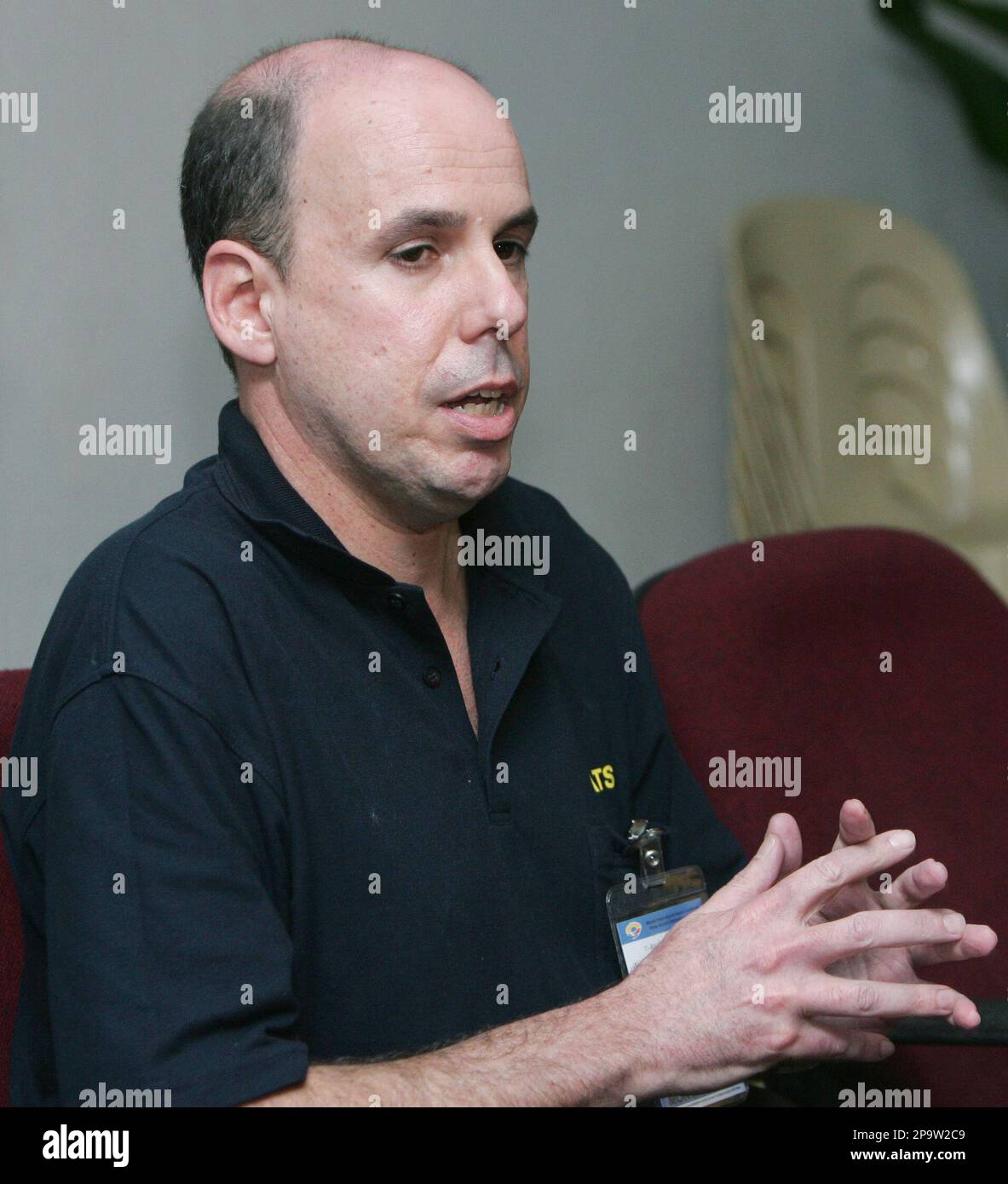 Neville Blyth of the Australian Transport Safety Bureau talks to the ...