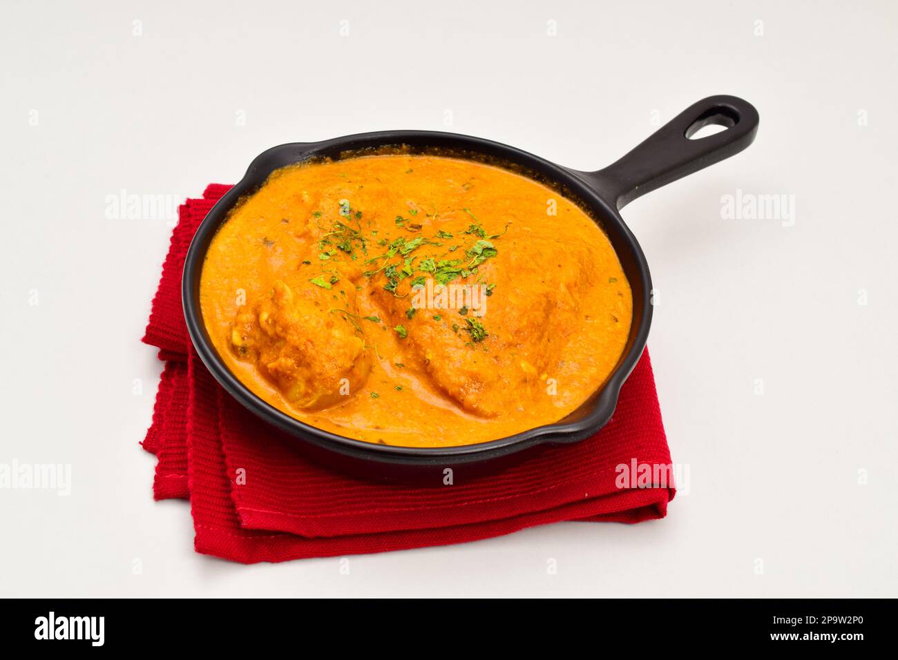 Butter chicken plate on white background, murg makhani Stock Photo - Alamy