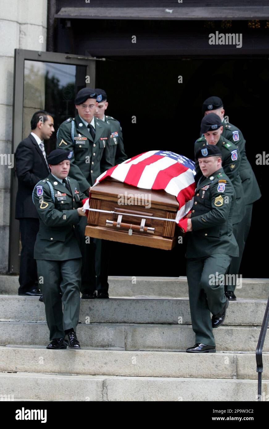 The casket carrying the remains of Army Staff Sgt. Alex Jimenez, is ...