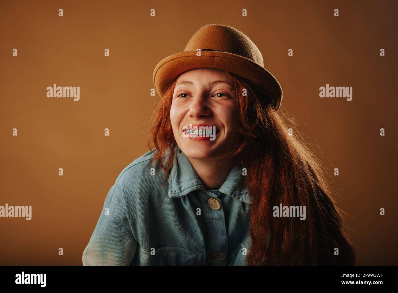 Pretty girl with braces and freckles hi-res stock photography and ...