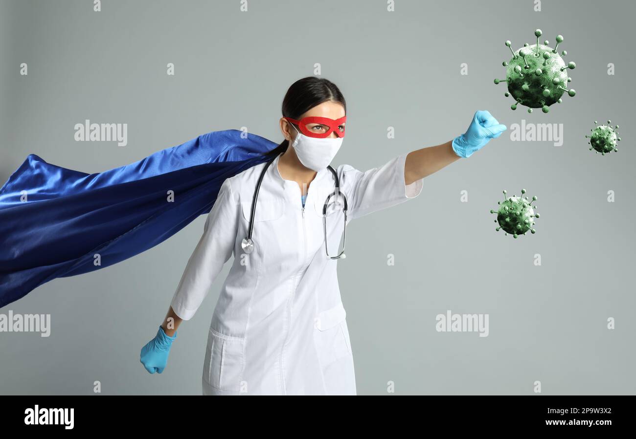Female doctor face mask fighting hi-res stock photography and images ...