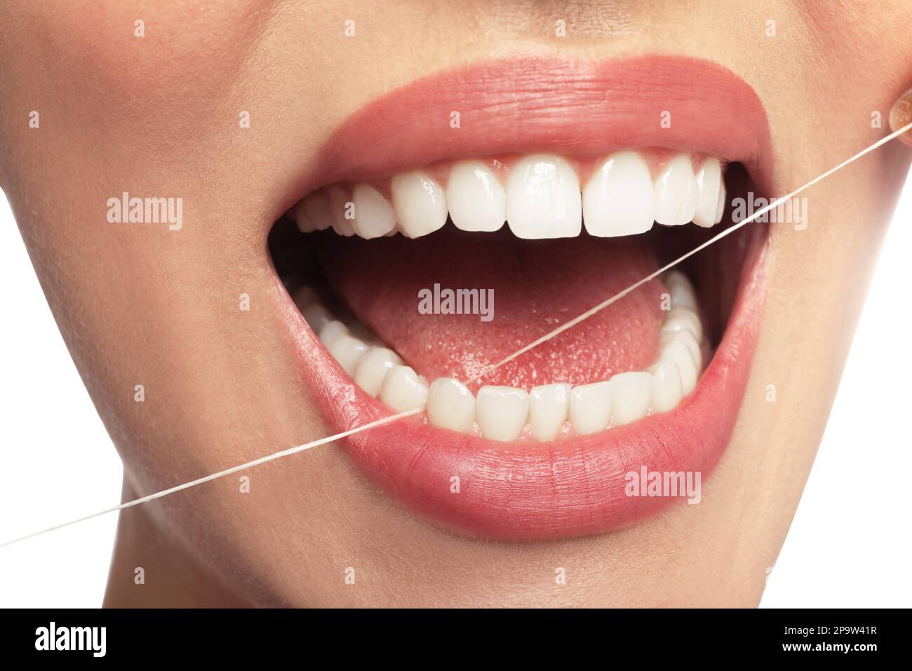 Woman flossing her teeth hi-res stock photography and images - Alamy